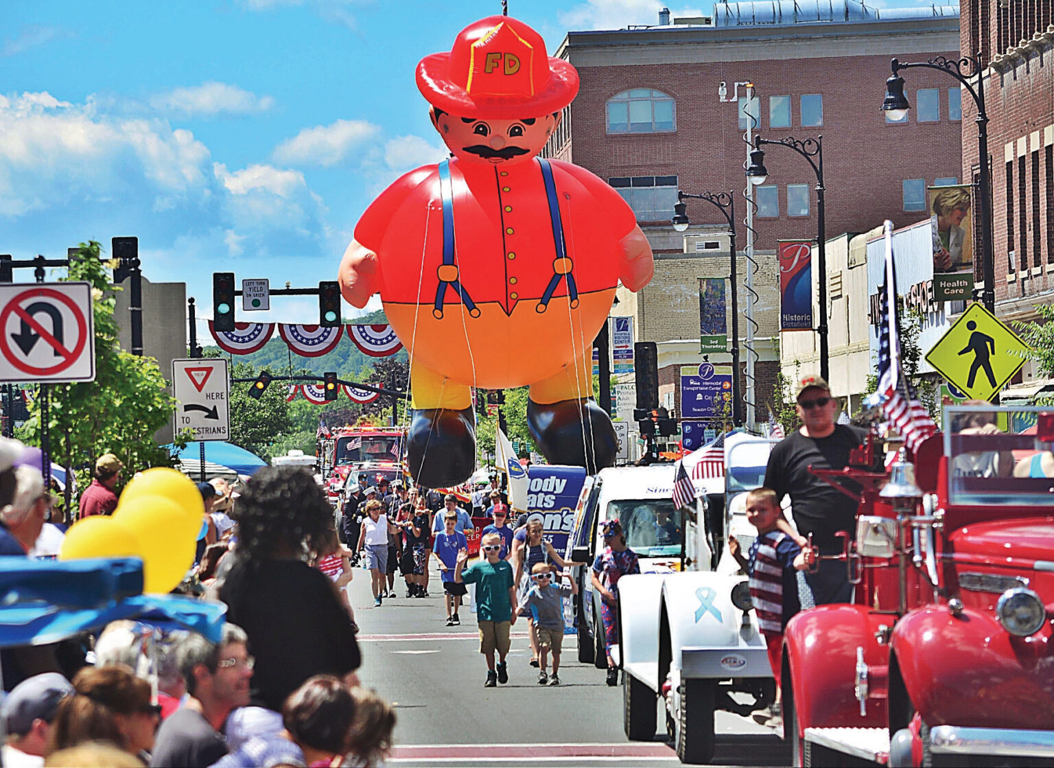 Fireman Parade Balloon - Fabulous Inflatables, Rounders, Helium Parade